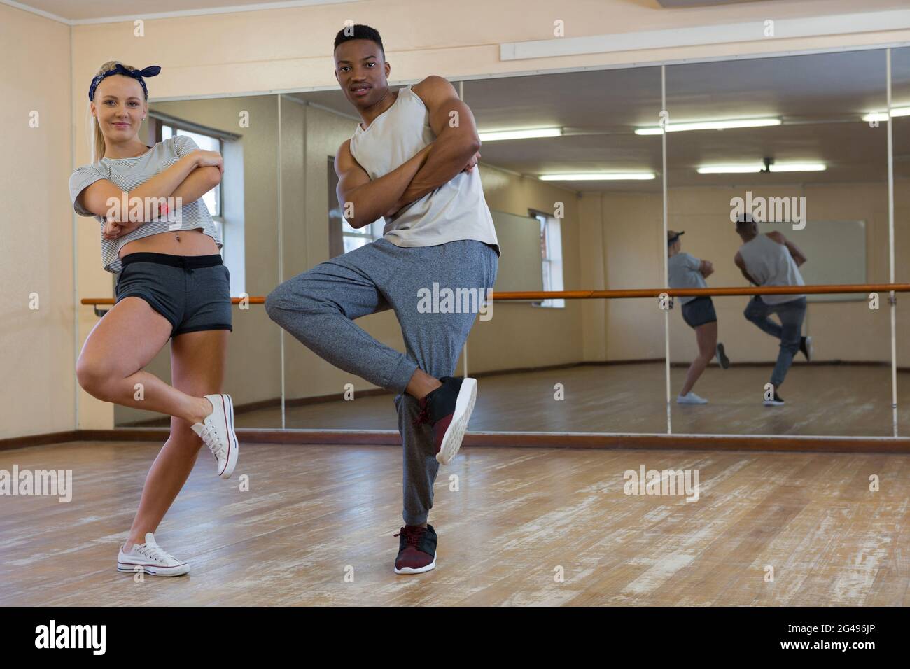 Full length portrait of friends practicing dance Stock Photo - Alamy