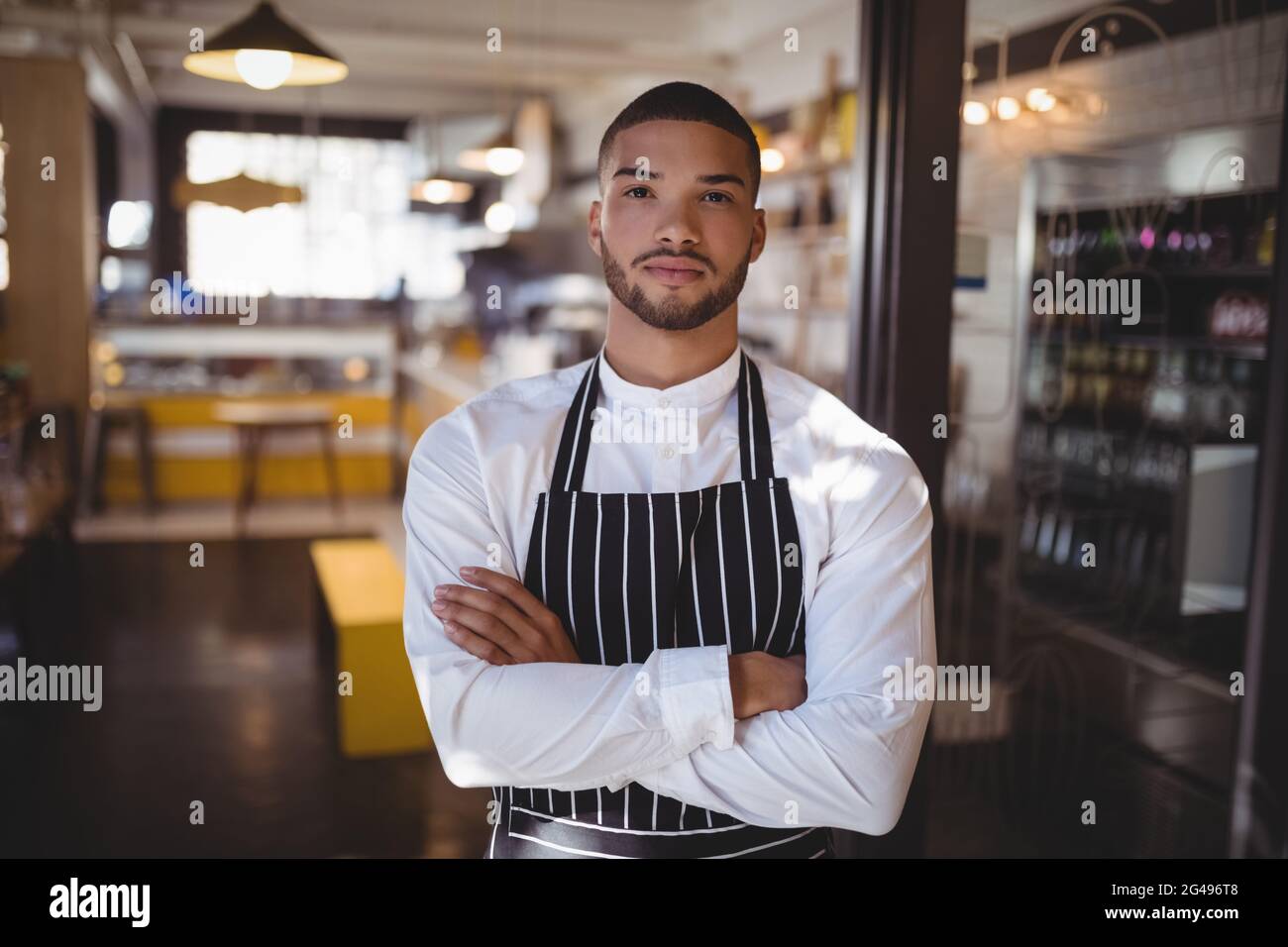 Handsome waiter looking camera hi-res stock photography and images - Alamy