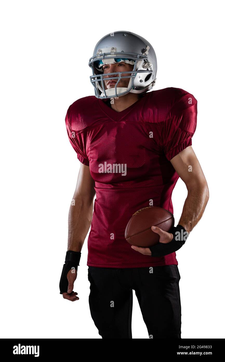 American football player wearing sports helmet Stock Photo - Alamy