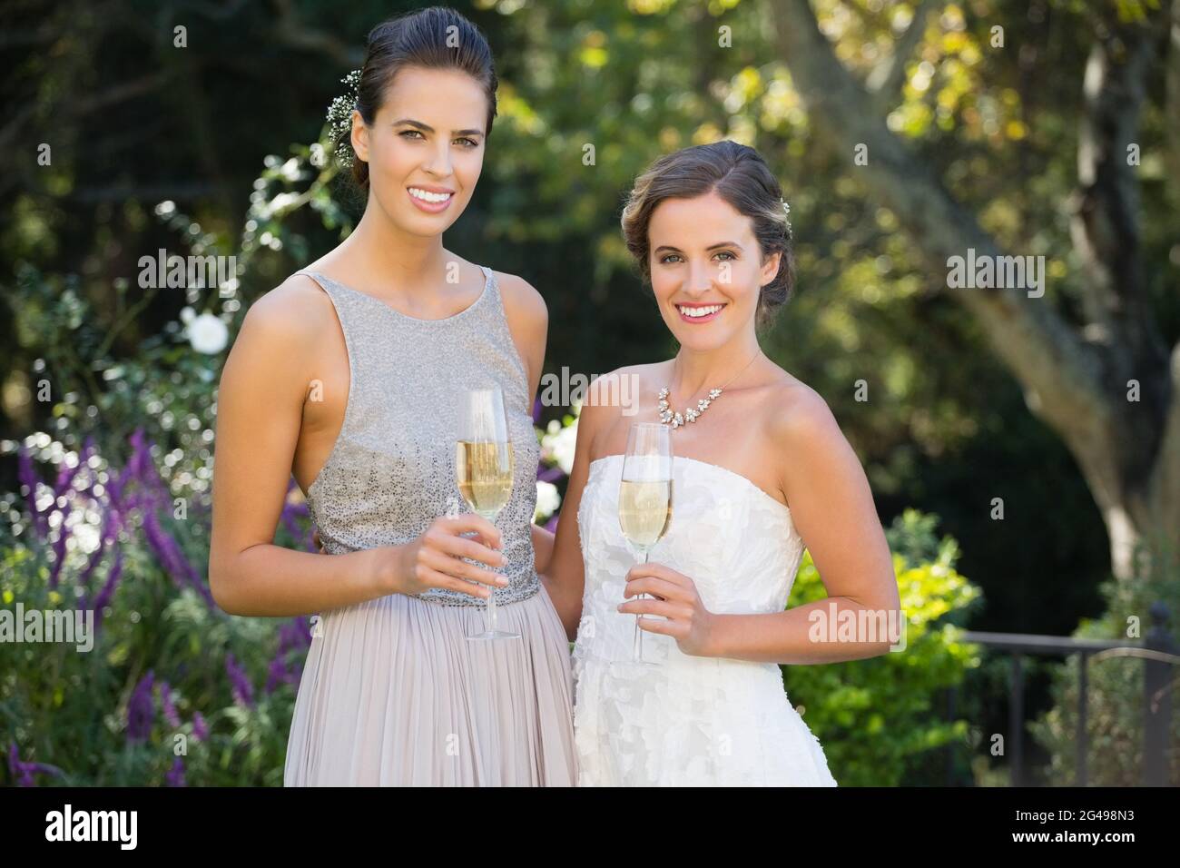 Portrait of bride and bridesmaid in wedding ceremony Stock Photo - Alamy