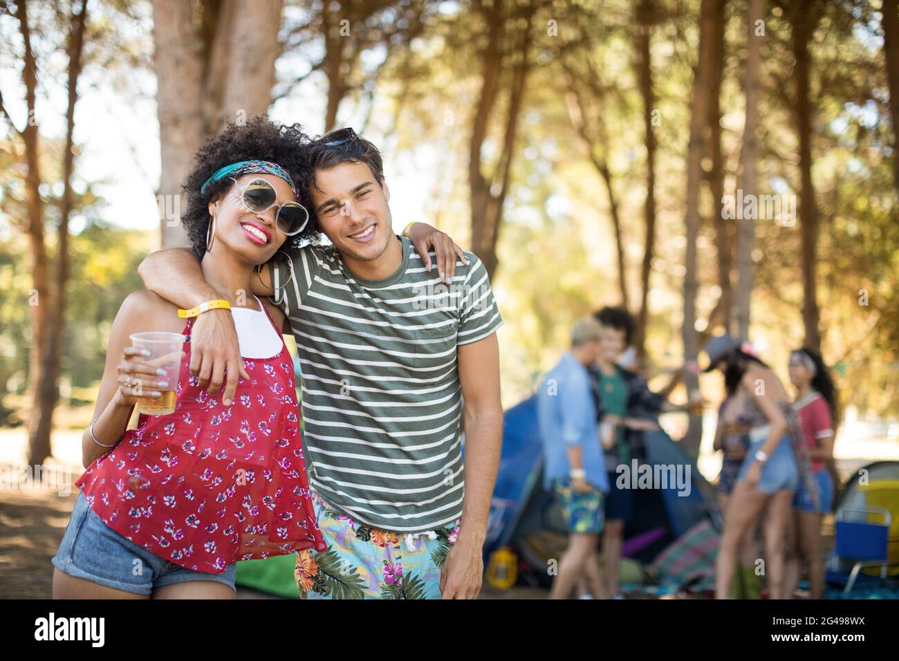 Young friends standing together hi-res stock photography and images - Alamy