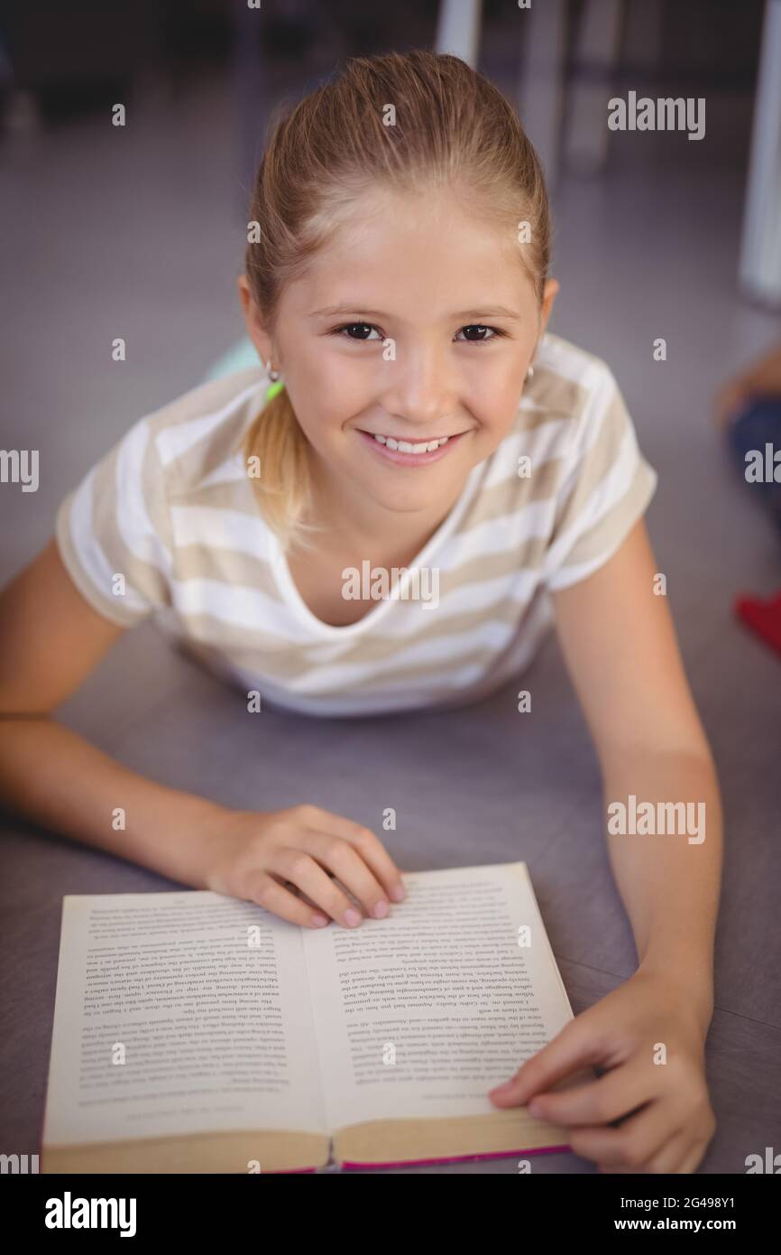 Schoolgirl studying in library hi-res stock photography and images - Alamy