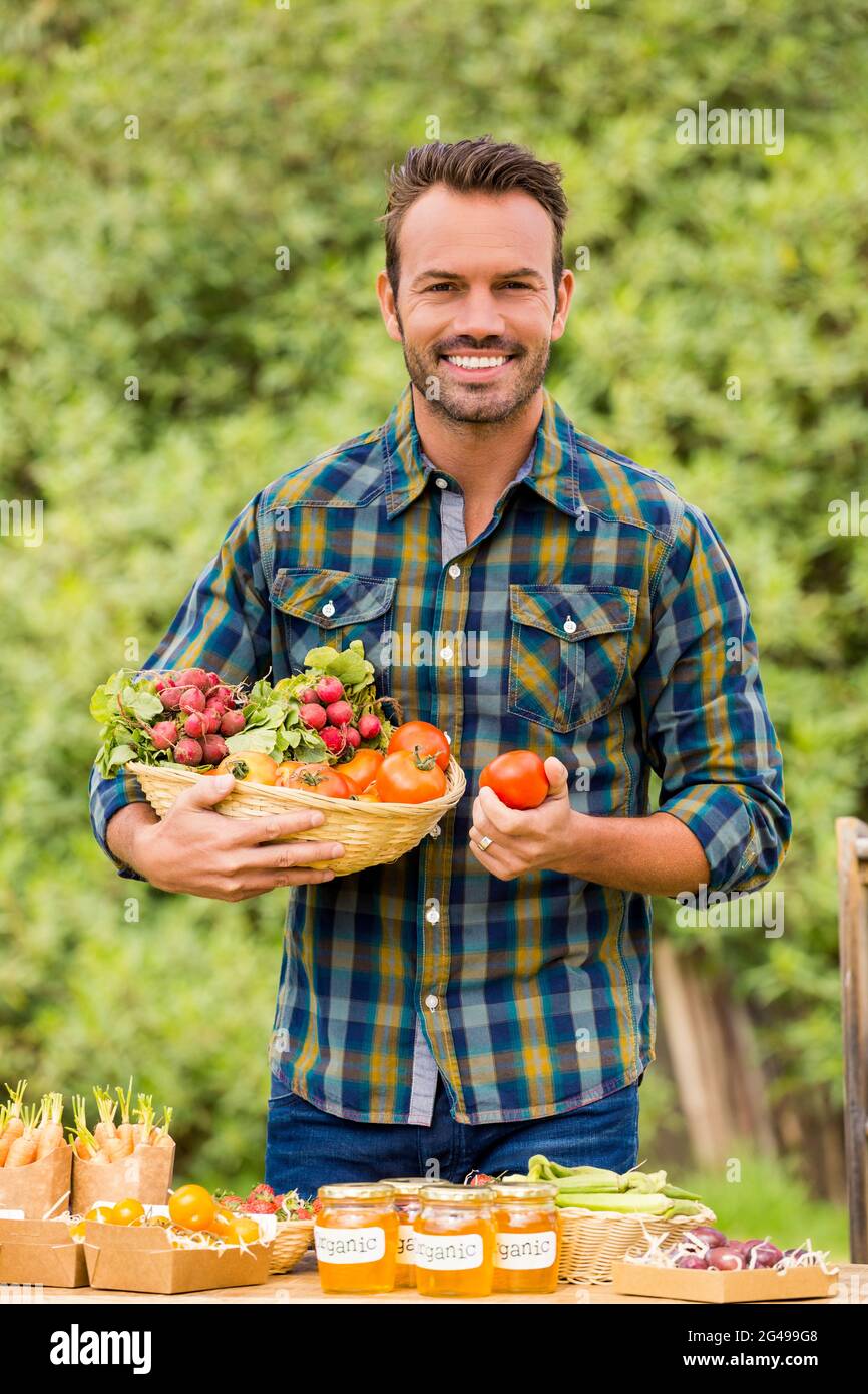 Young man selling fruit vegetables hi-res stock photography and images ...