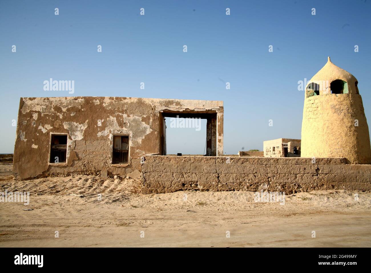 Old coral stone mosque in Jazirah al-Hamra, abandoned town in Ras al ...