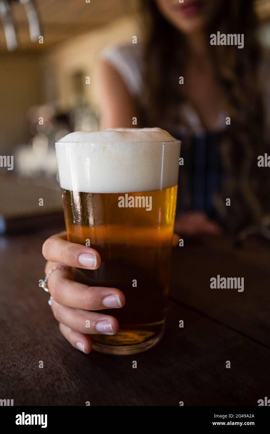 Barmaid at hotel bar hi-res stock photography and images - Alamy