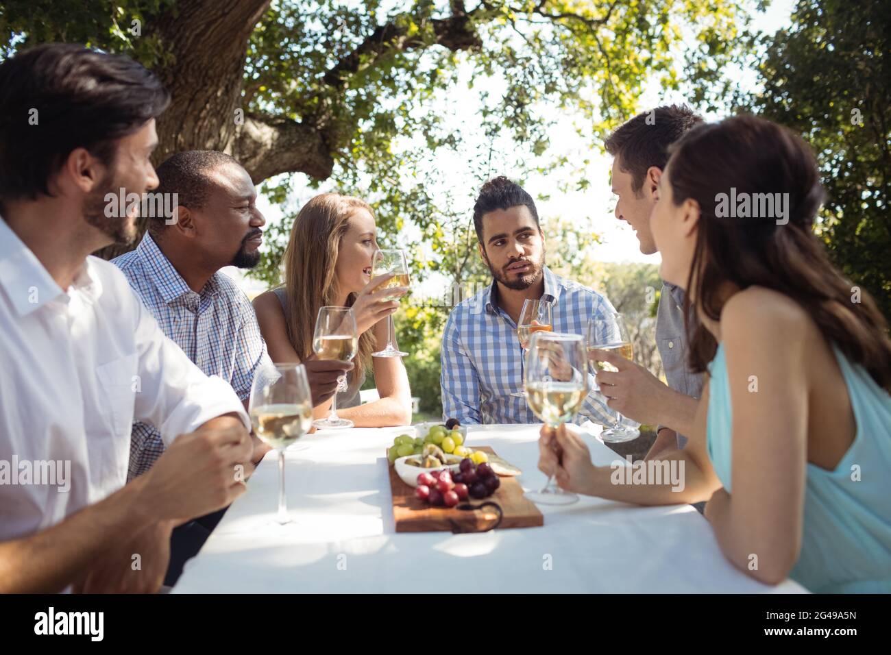 Young friends interacting other hi-res stock photography and images - Alamy