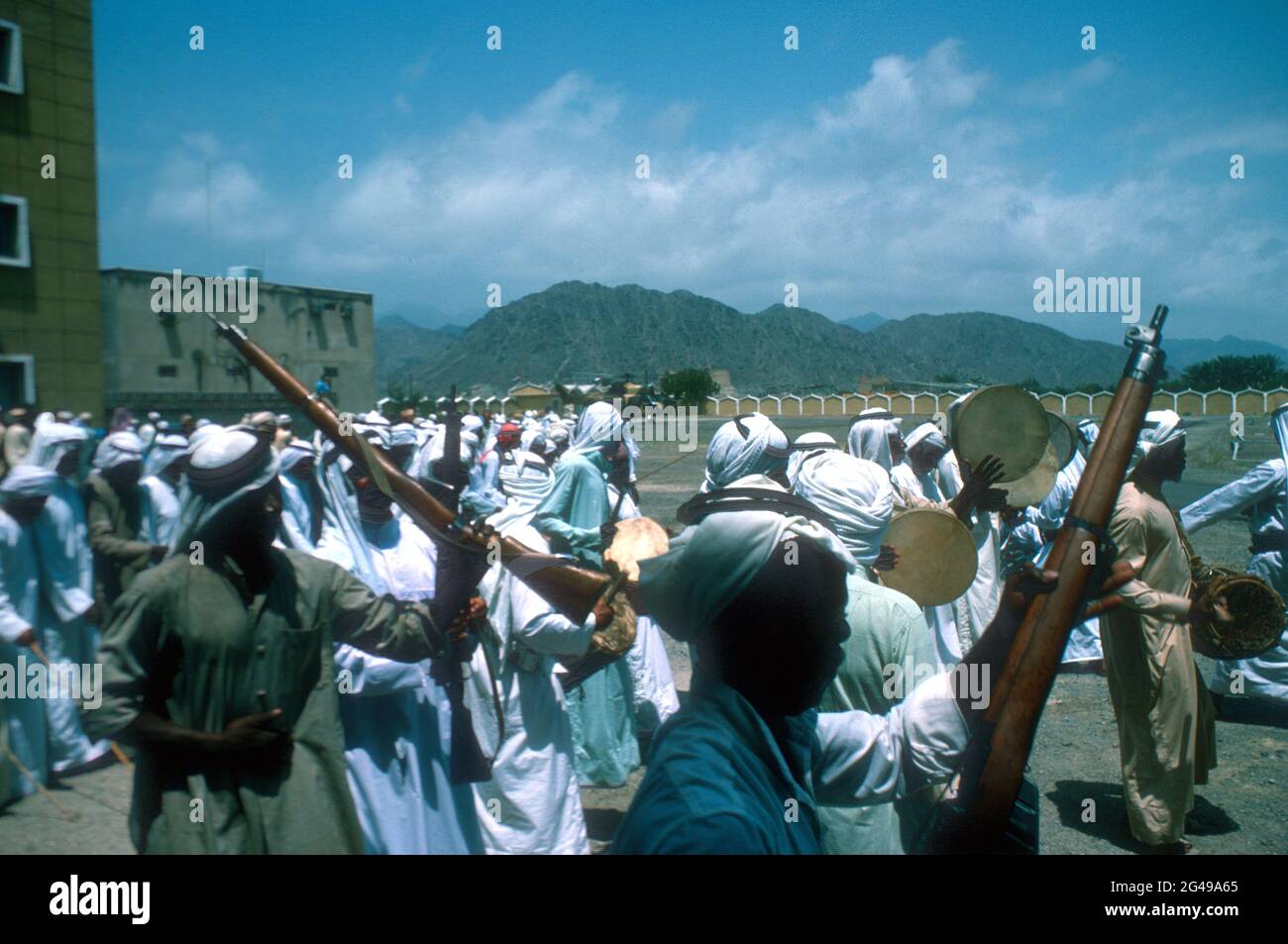 Eid dancing outside ruler's palace Fujairah, UAE 1978 Stock Photo - Alamy