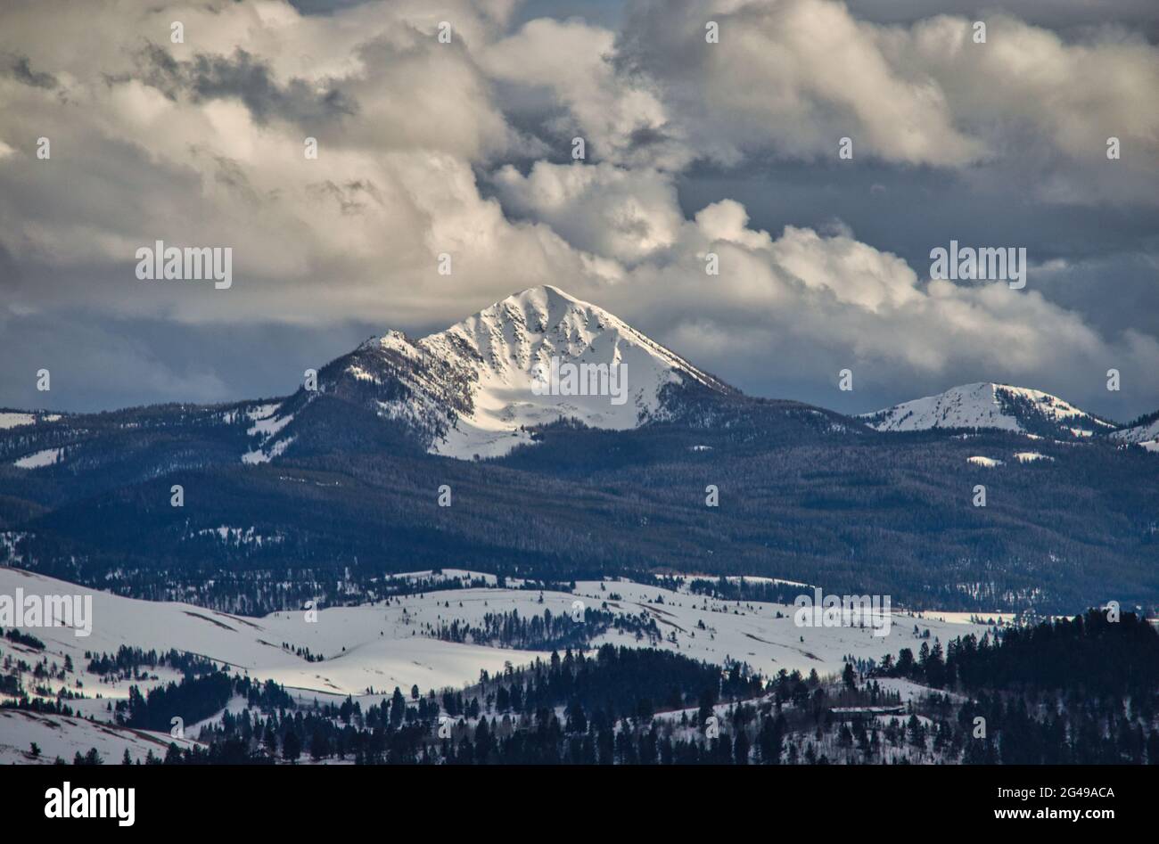 A beautiful shot of a majestic snowy mountain range on background of ...