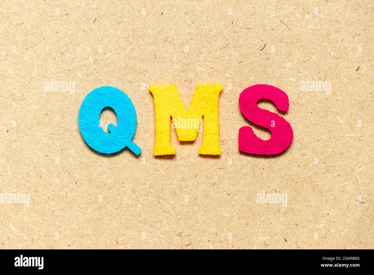 Color cloth alphabet letter in word QMS (abbreviation of quality ...