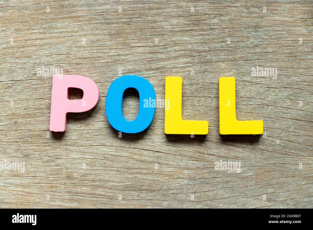 Color alphabet letter in word poll on wood background Stock Photo - Alamy