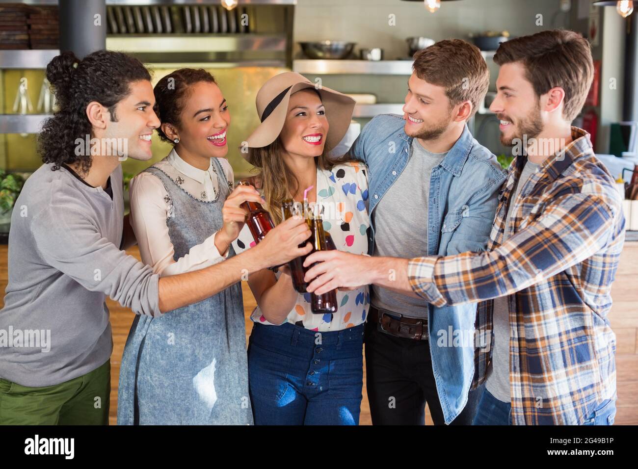 Toasting beer bottles in hi-res stock photography and images - Alamy