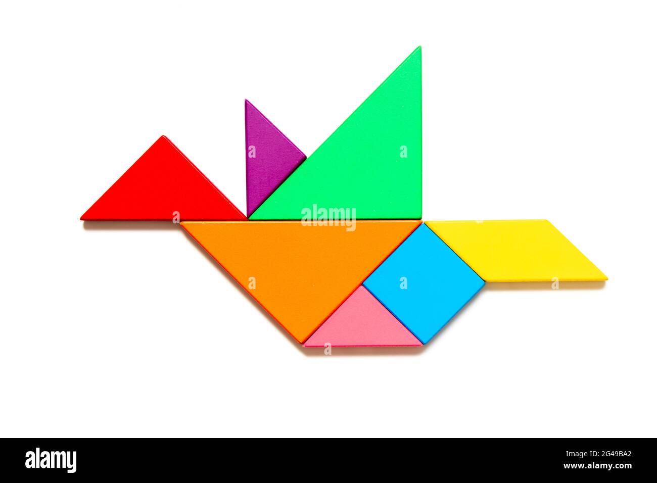 Color tangram puzzle in flying bird shape on white background Stock ...