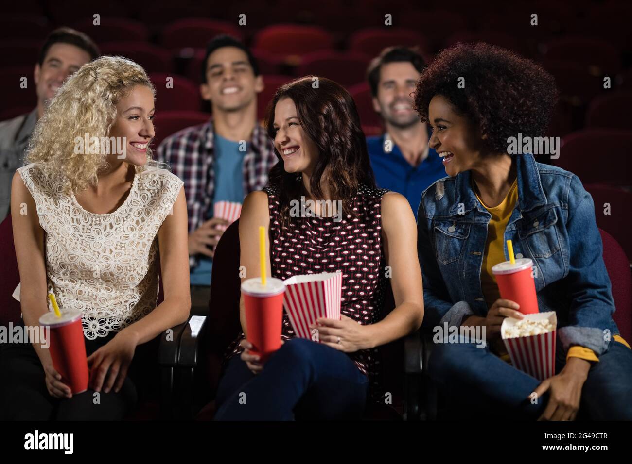 Group of people watching movie Stock Photo - Alamy