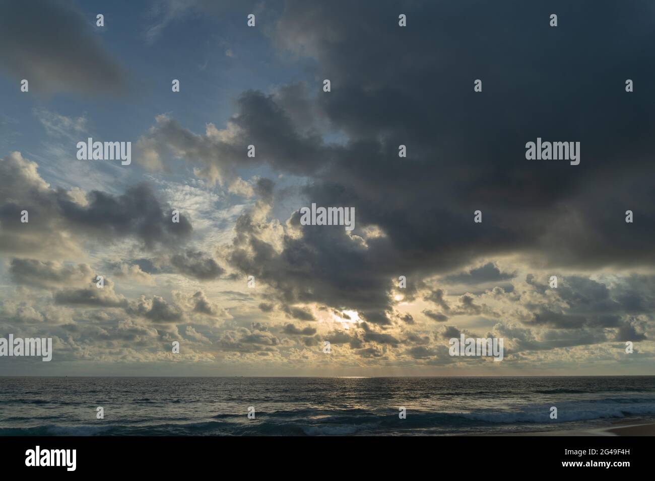 aerial view rain clouds Dark storm clouds over ocean open sea in ...