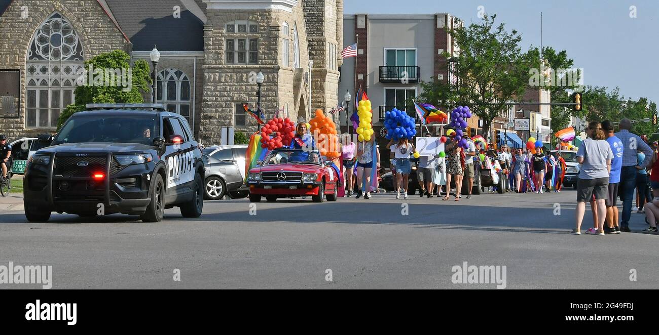 Local residents stand along Commercial street to view the first ever ...