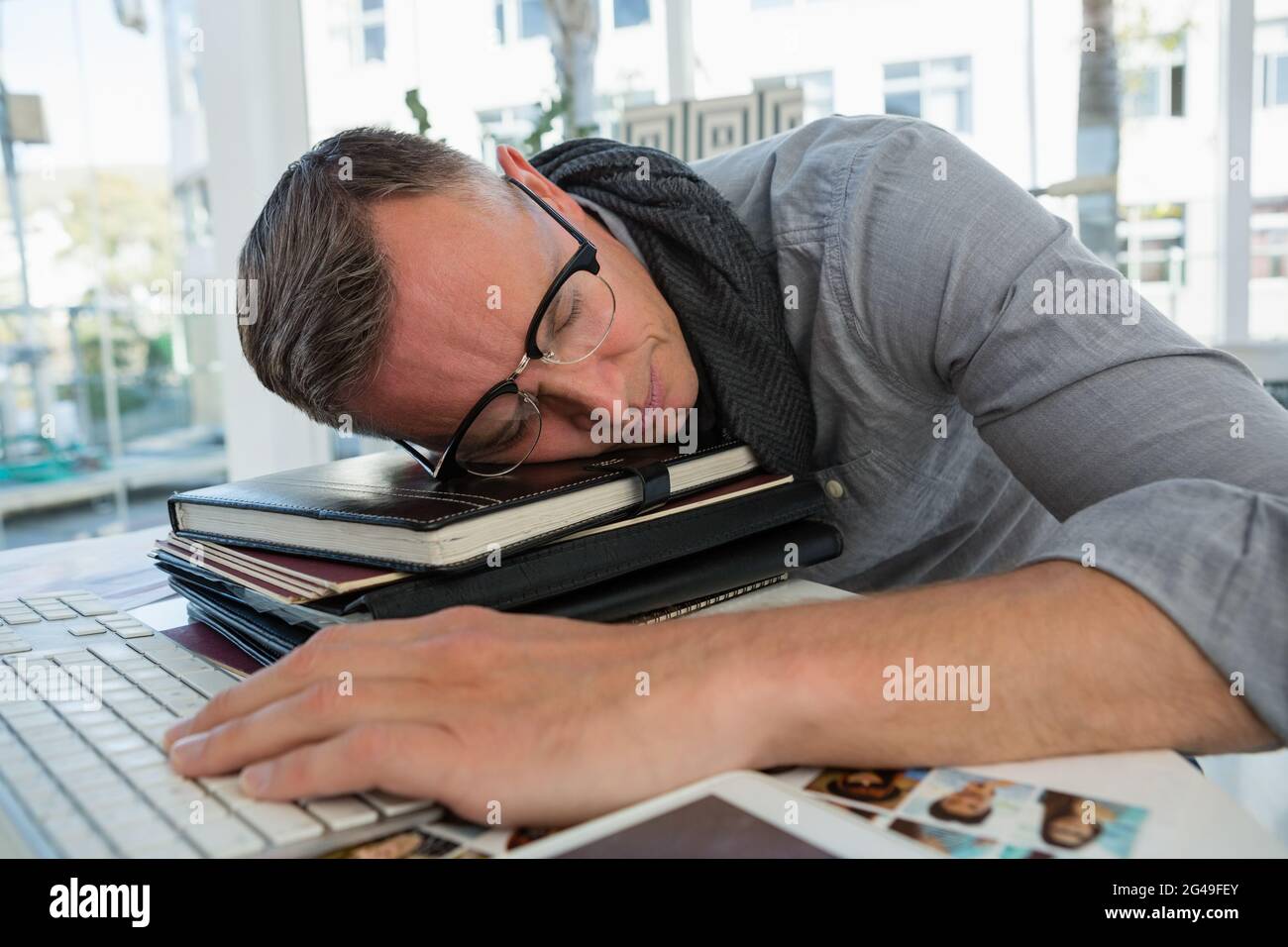 Man sleeping keyboard in computer hi-res stock photography and images ...