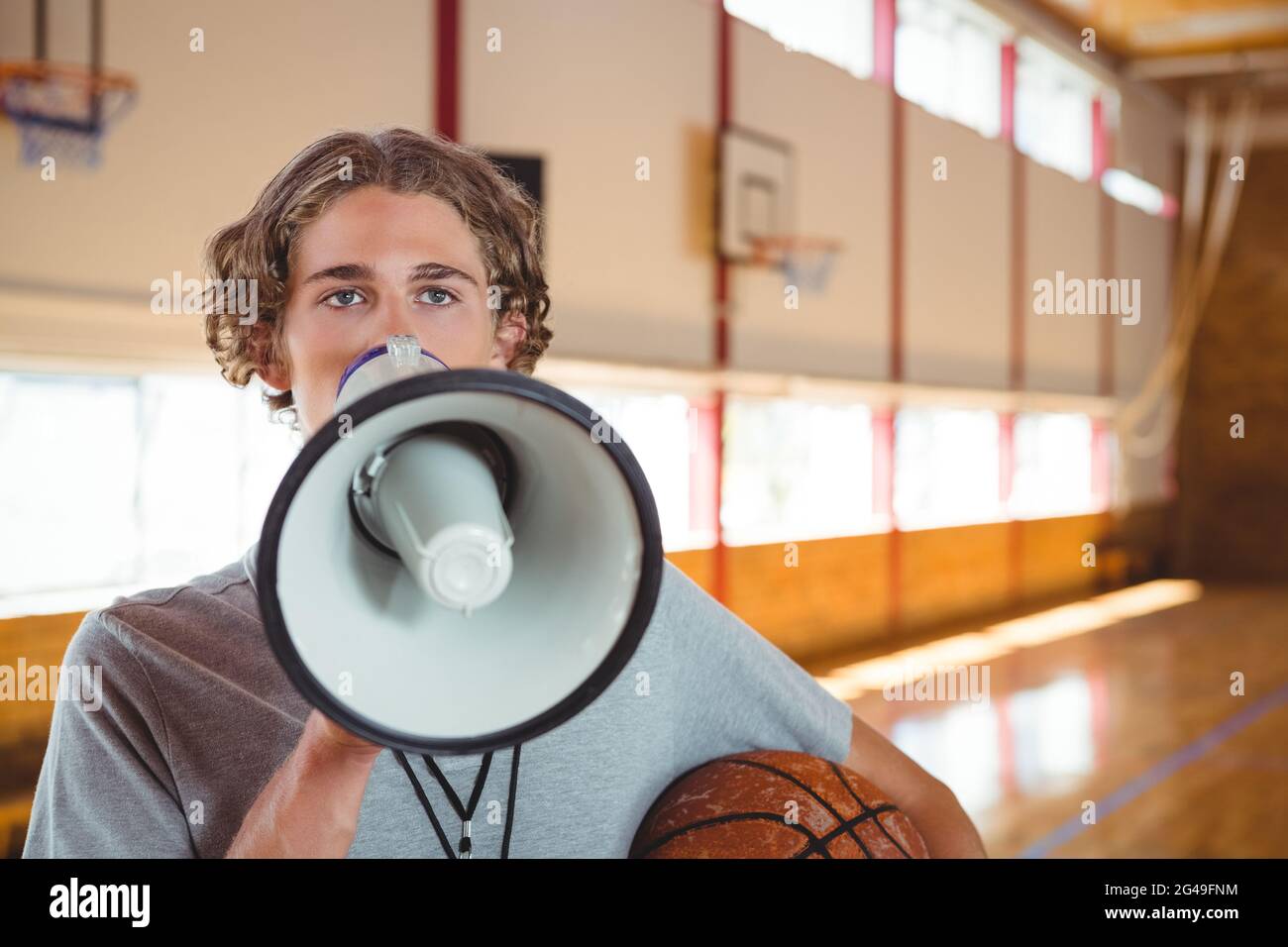 Coach using megaphone Stock Photo - Alamy