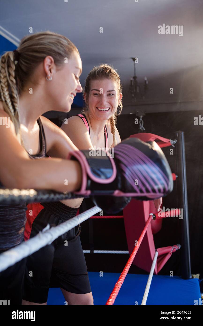 Trainee and coach interacting with each other Stock Photo - Alamy