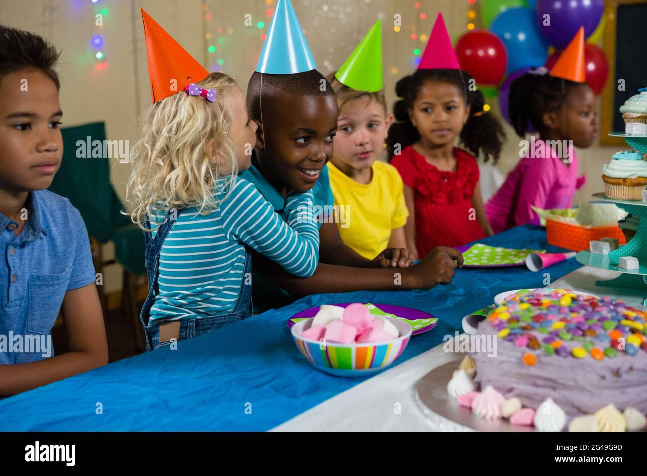 Girl whispering group hi-res stock photography and images - Alamy