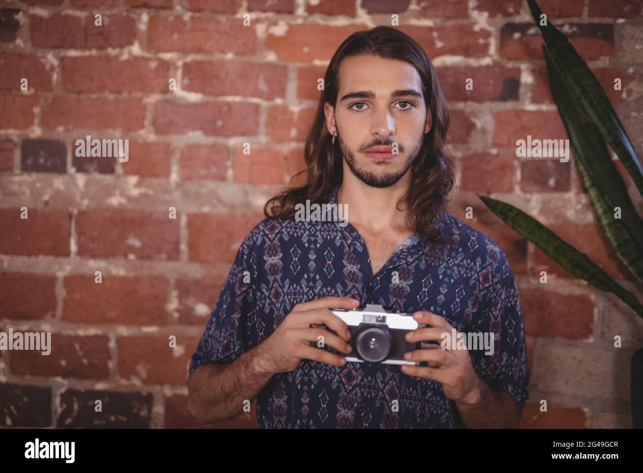 Portrait confident young photographer hi-res stock photography and ...