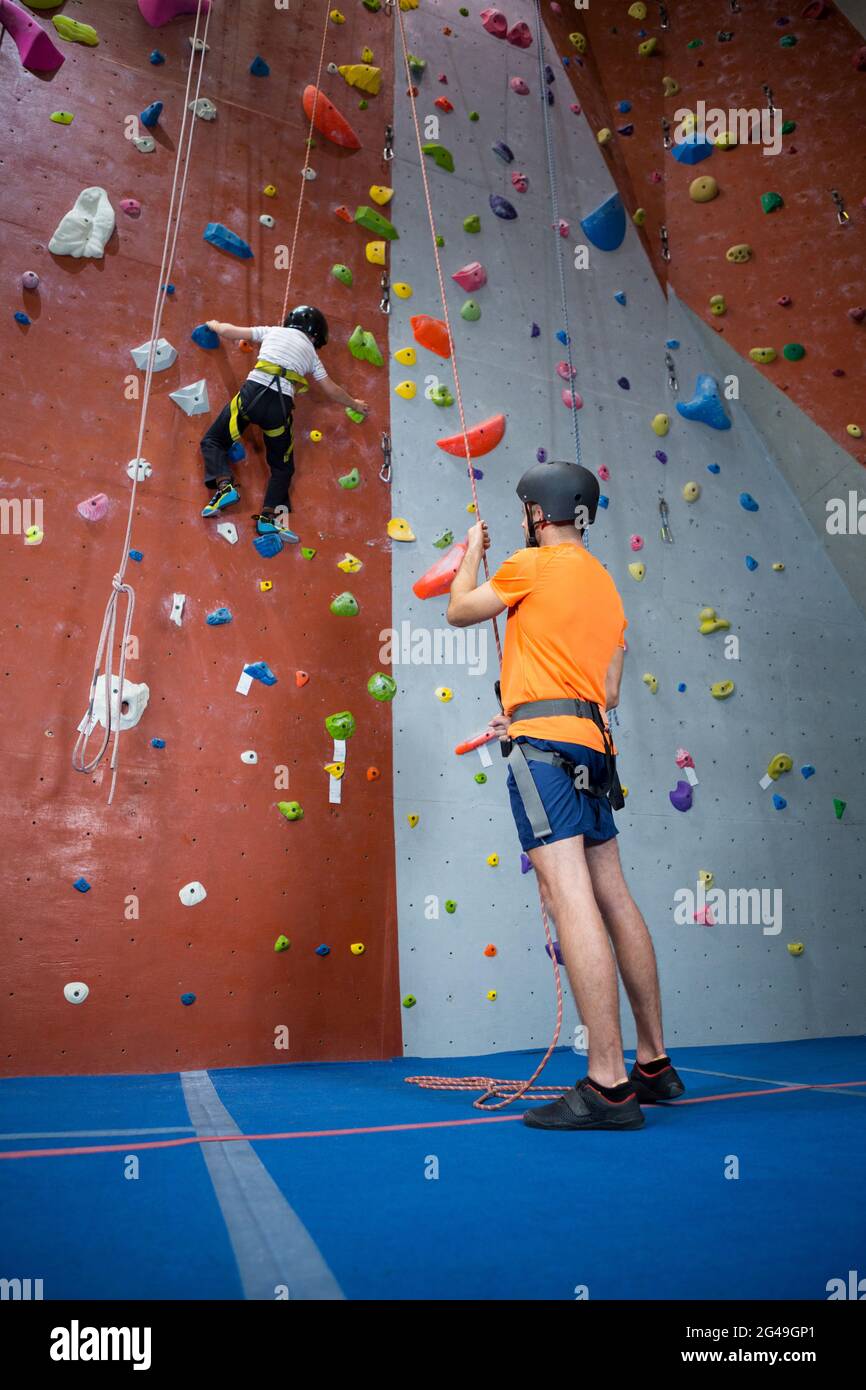Helping indoor climbing rope hi-res stock photography and images - Alamy