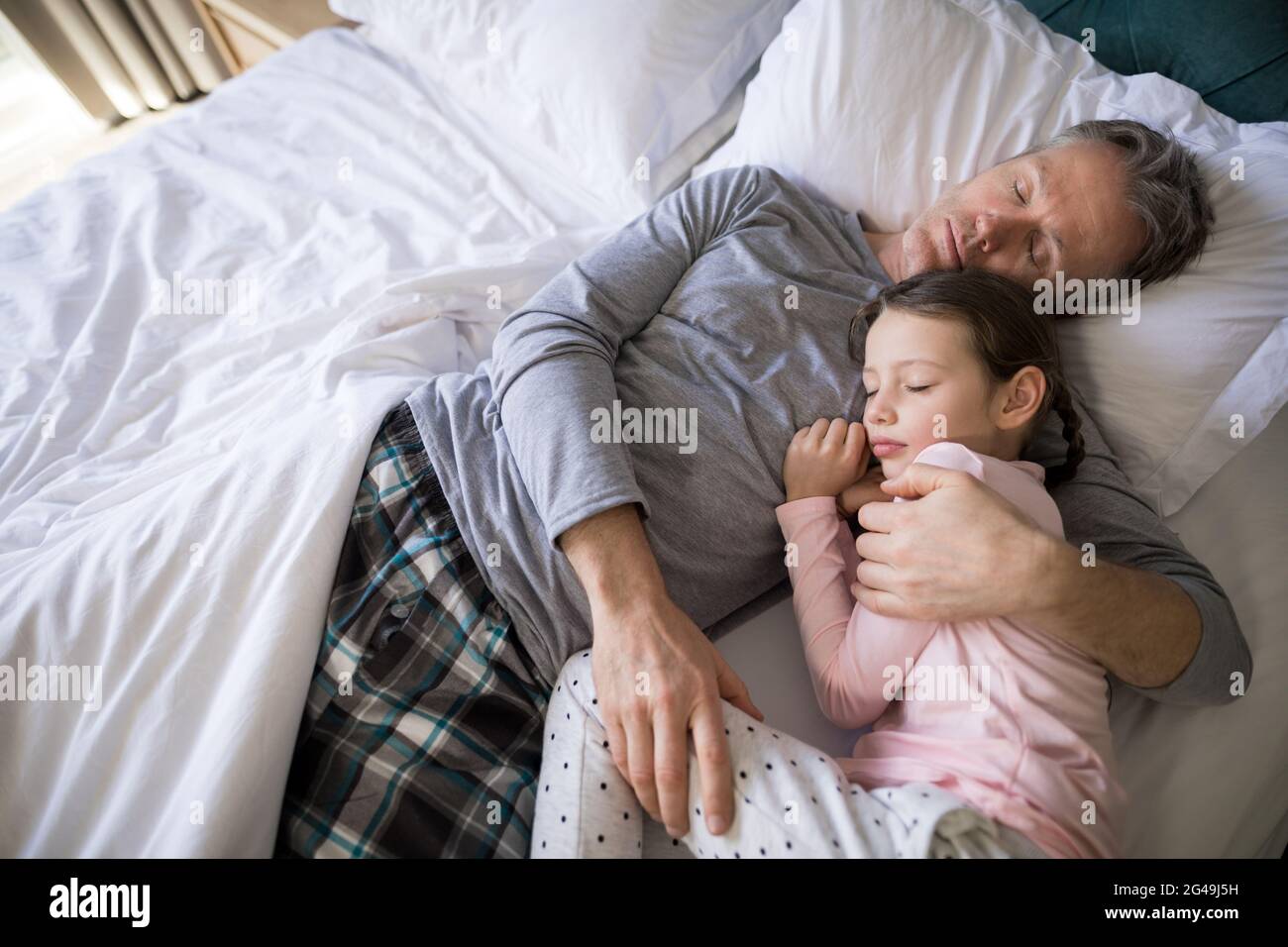 Father daughter sleeping together in hi-res stock photography and ...