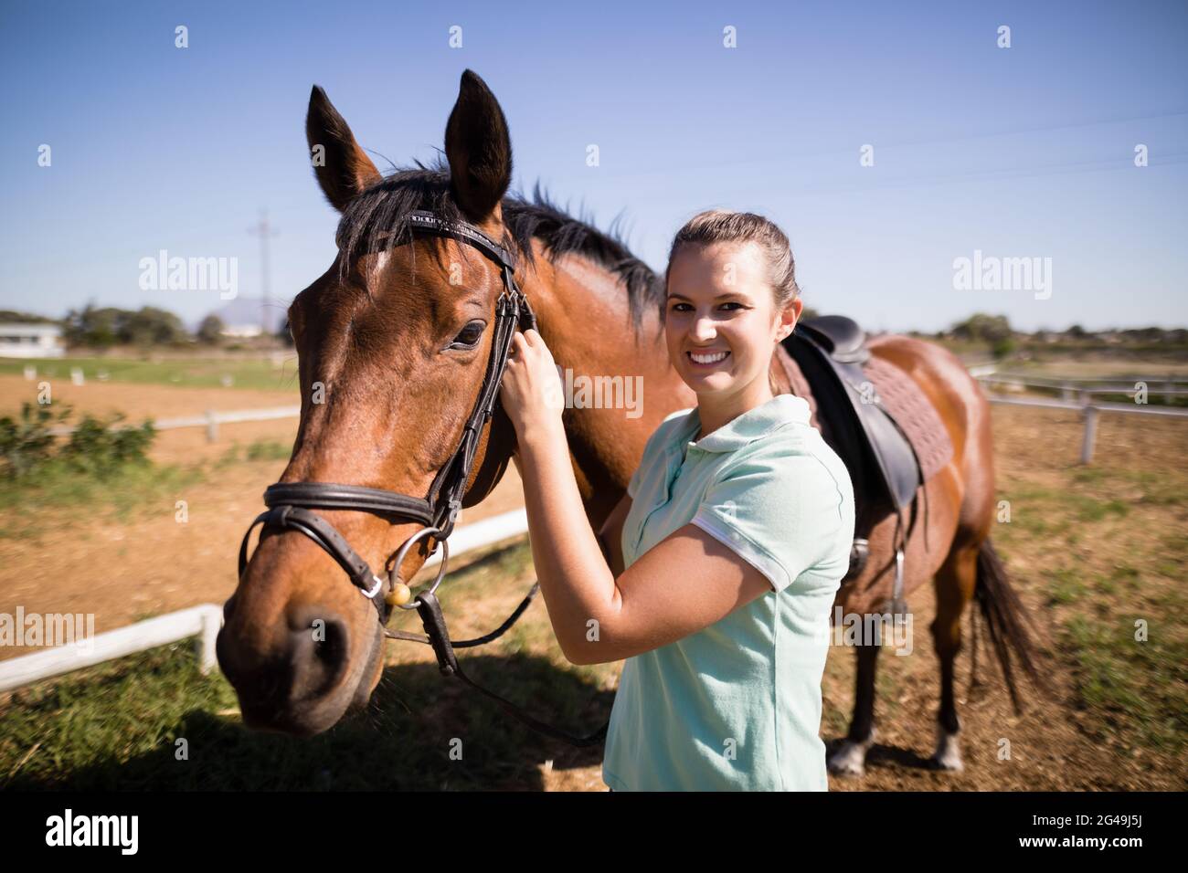Portrait female jockey standing horse hi-res stock photography and ...
