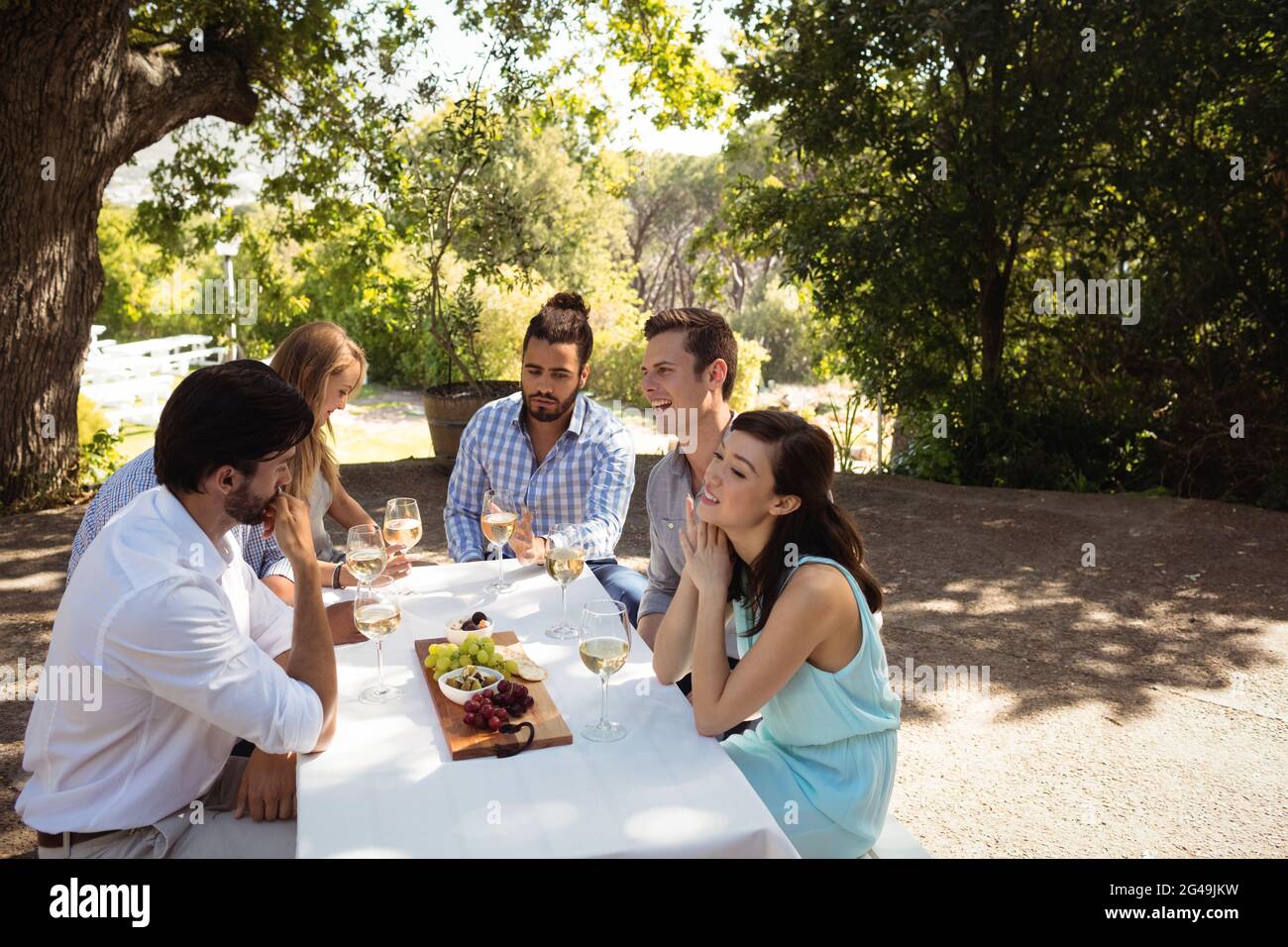 Young friends interacting other hi-res stock photography and images - Alamy
