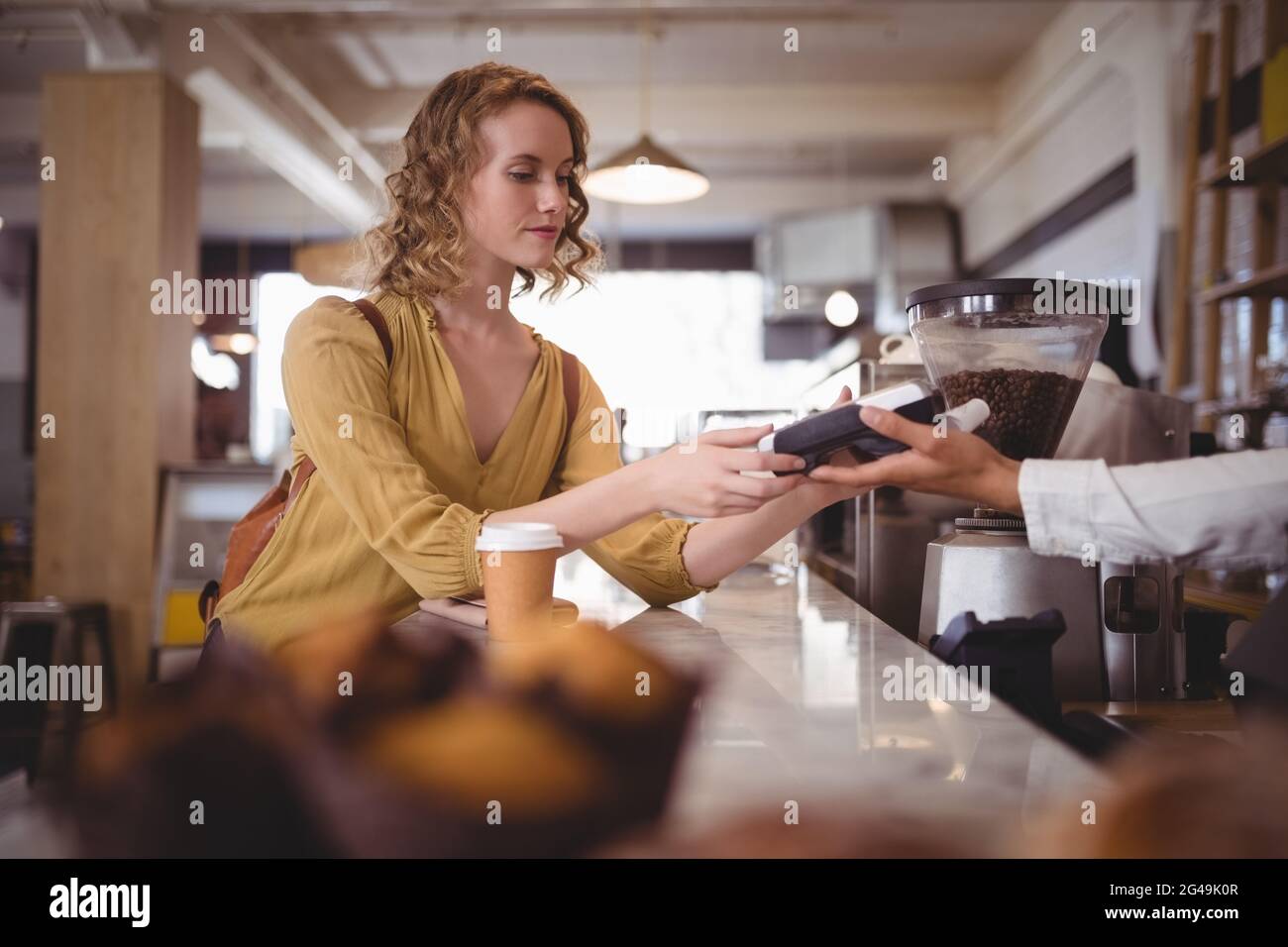 Paying through card hi-res stock photography and images - Alamy