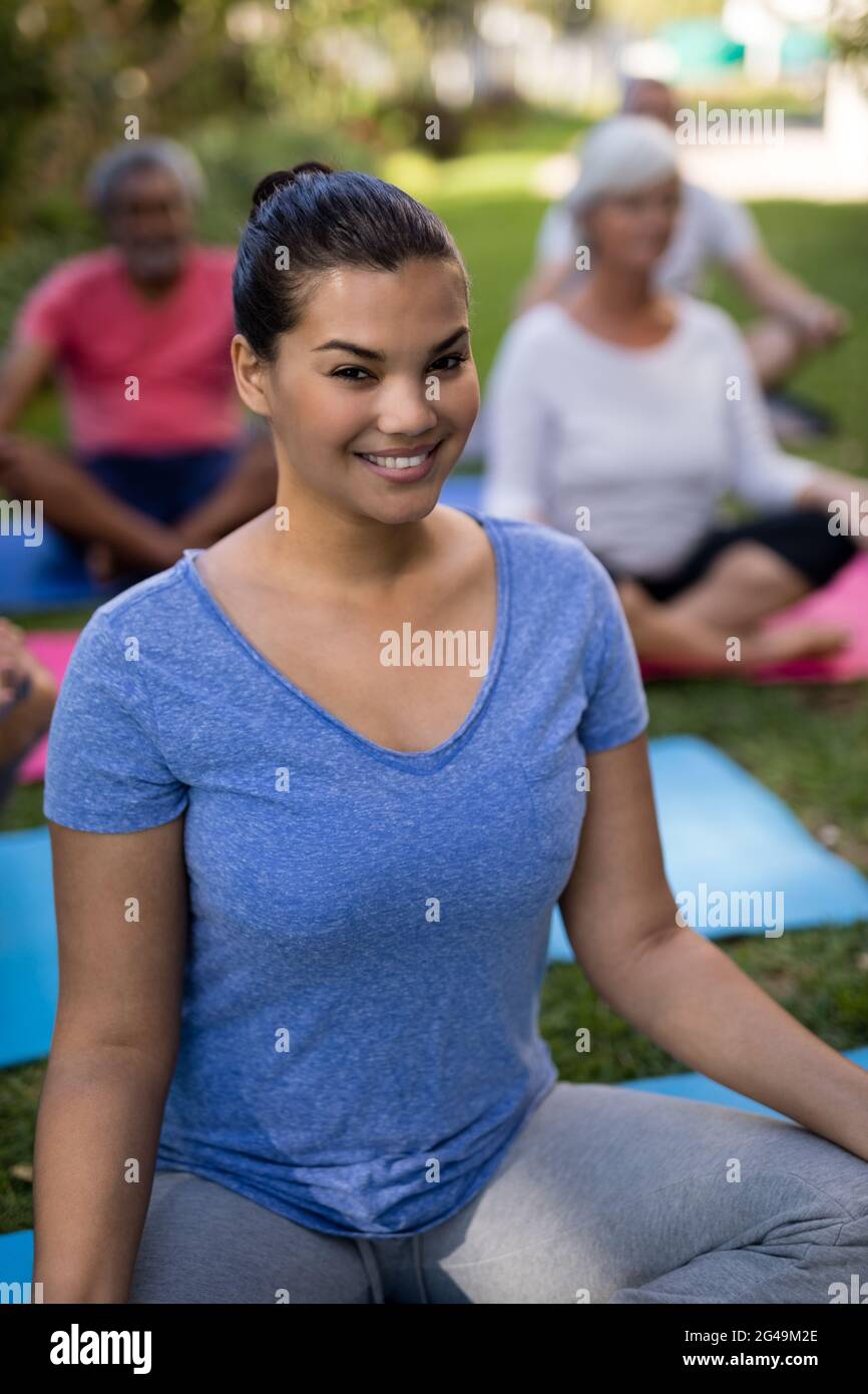Portrait of smiling trainer with senior people Stock Photo - Alamy