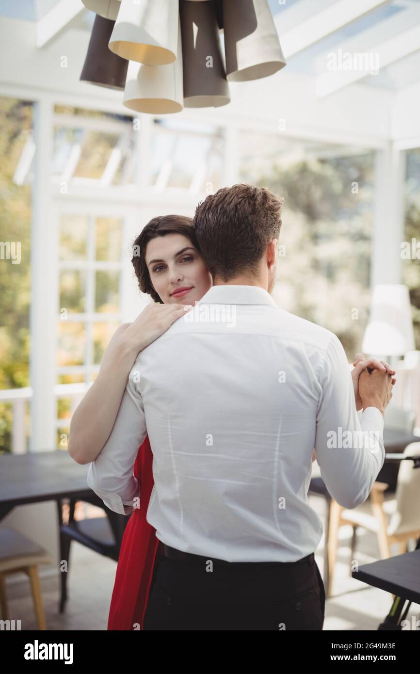 Romantic couple dancing with hand in hand Stock Photo - Alamy