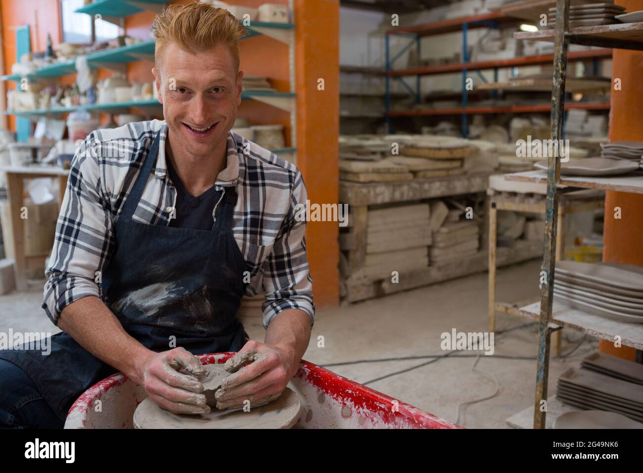 Male potter making pot in hi-res stock photography and images - Alamy