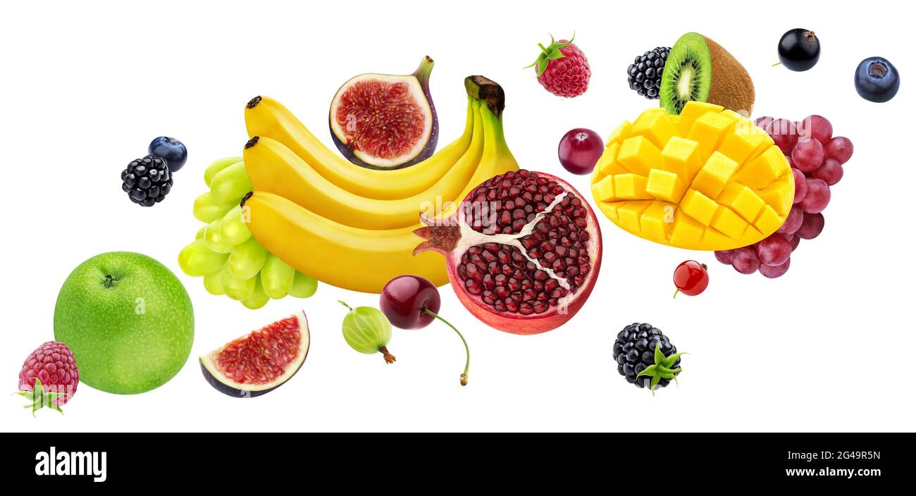 Falling fruits and berries isolated on white background Stock Photo - Alamy