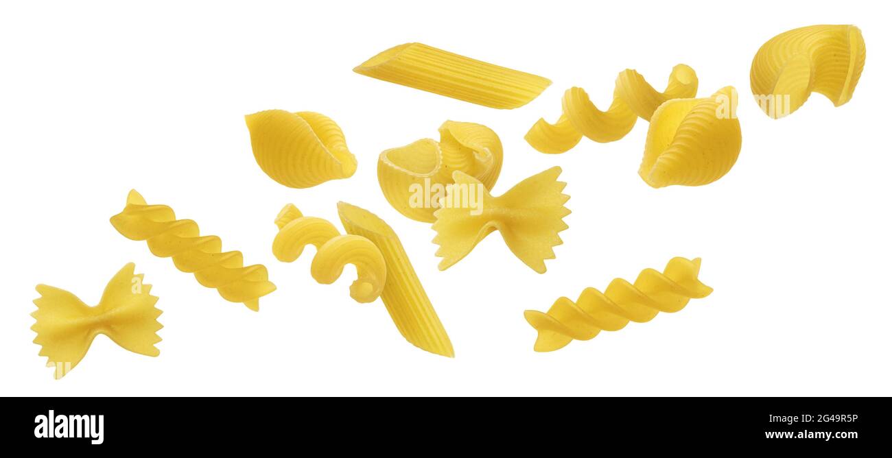 Falling raw pasta mix isolated on white background Stock Photo - Alamy
