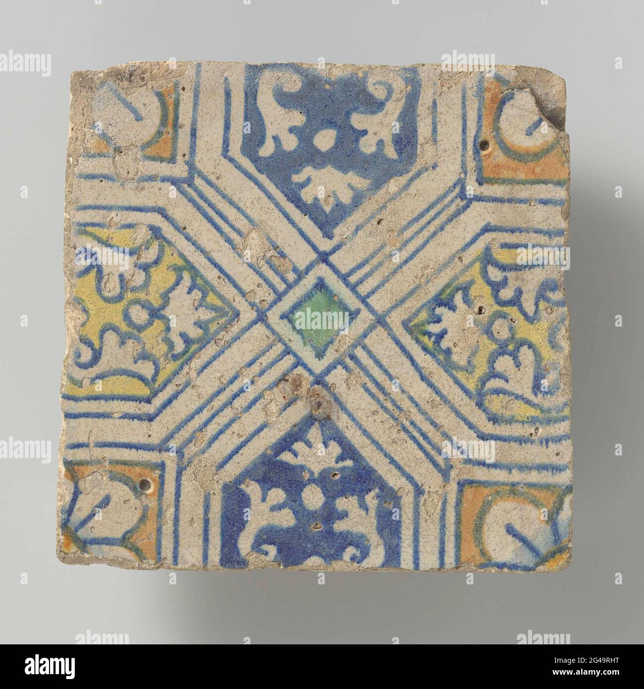 Tile with leaf pattern. Tile with multicolored (blue, orange, yellow ...