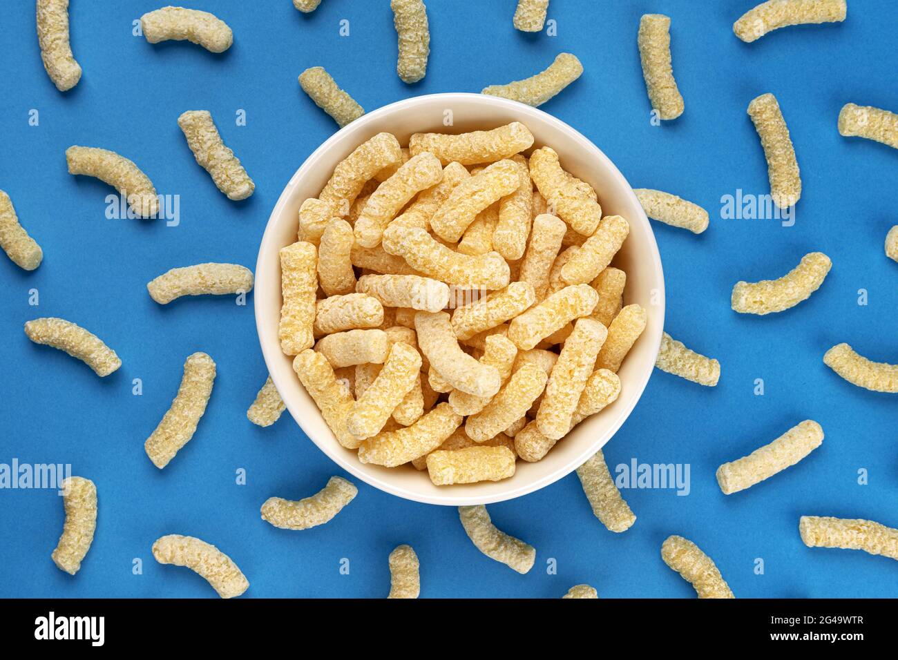 Sweet corn sticks isolated on blue background, top view Stock Photo - Alamy