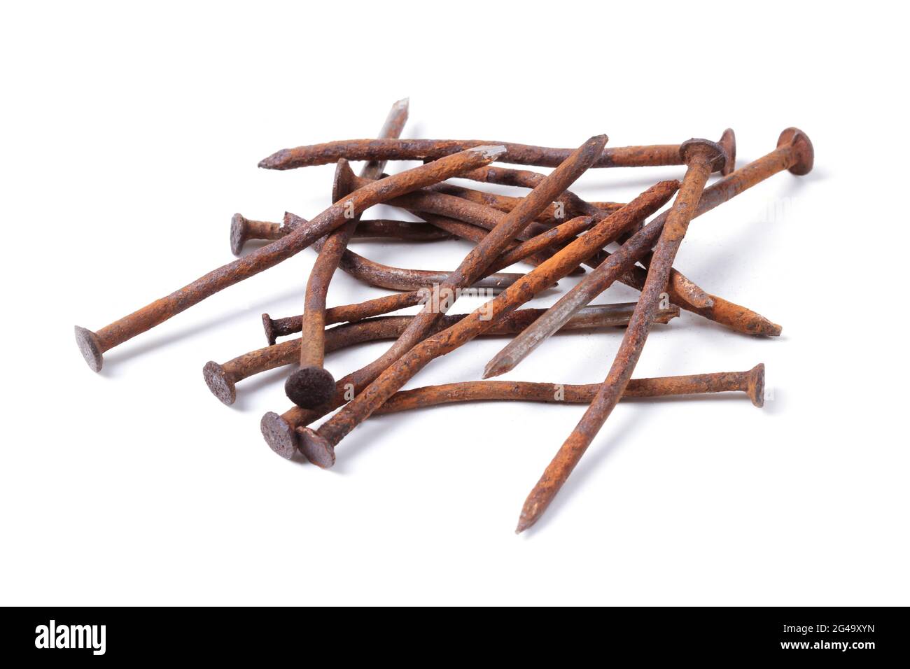 Old bent rusty nails isolated on white background Stock Photo - Alamy