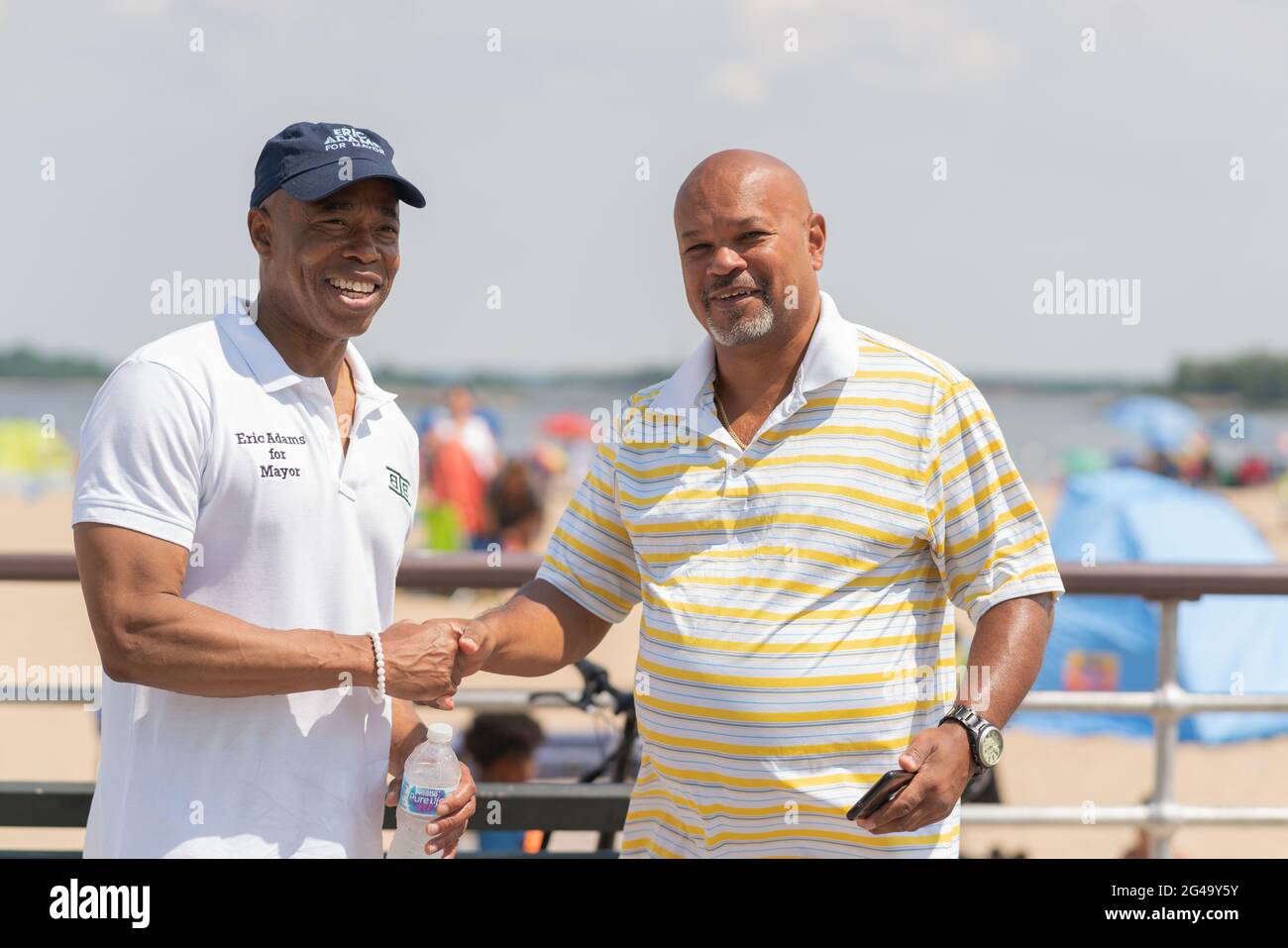 Bronx, United States. 19th June, 2021. Eric Adams greets voters with ...