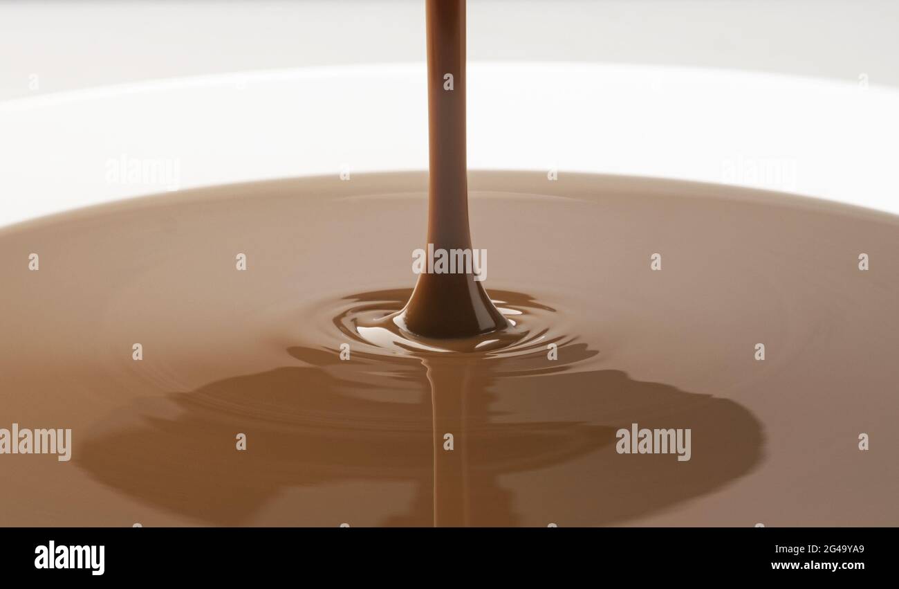 Pouring milk hot chocolate hi-res stock photography and images - Alamy