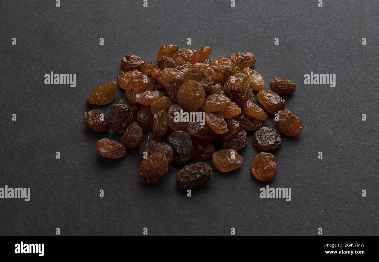 Dried black raisins hi-res stock photography and images - Alamy