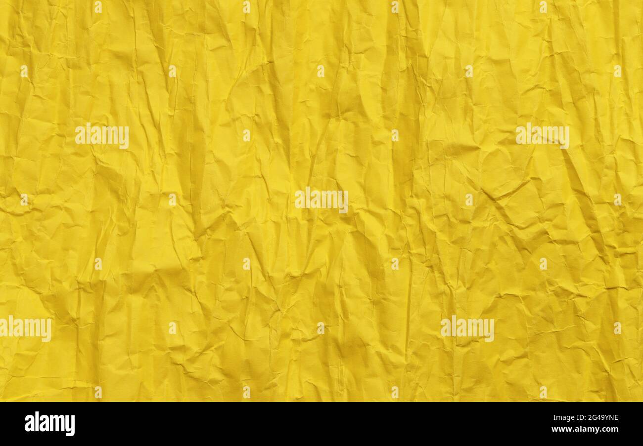 Yellow crumpled paper texture, grunge background Stock Photo - Alamy