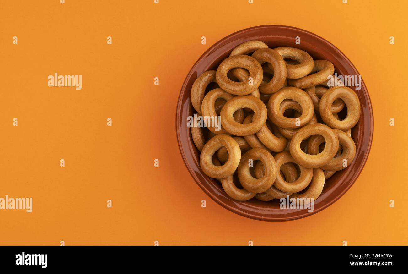 Russian bagels, bread rings on color background with copy space, top ...