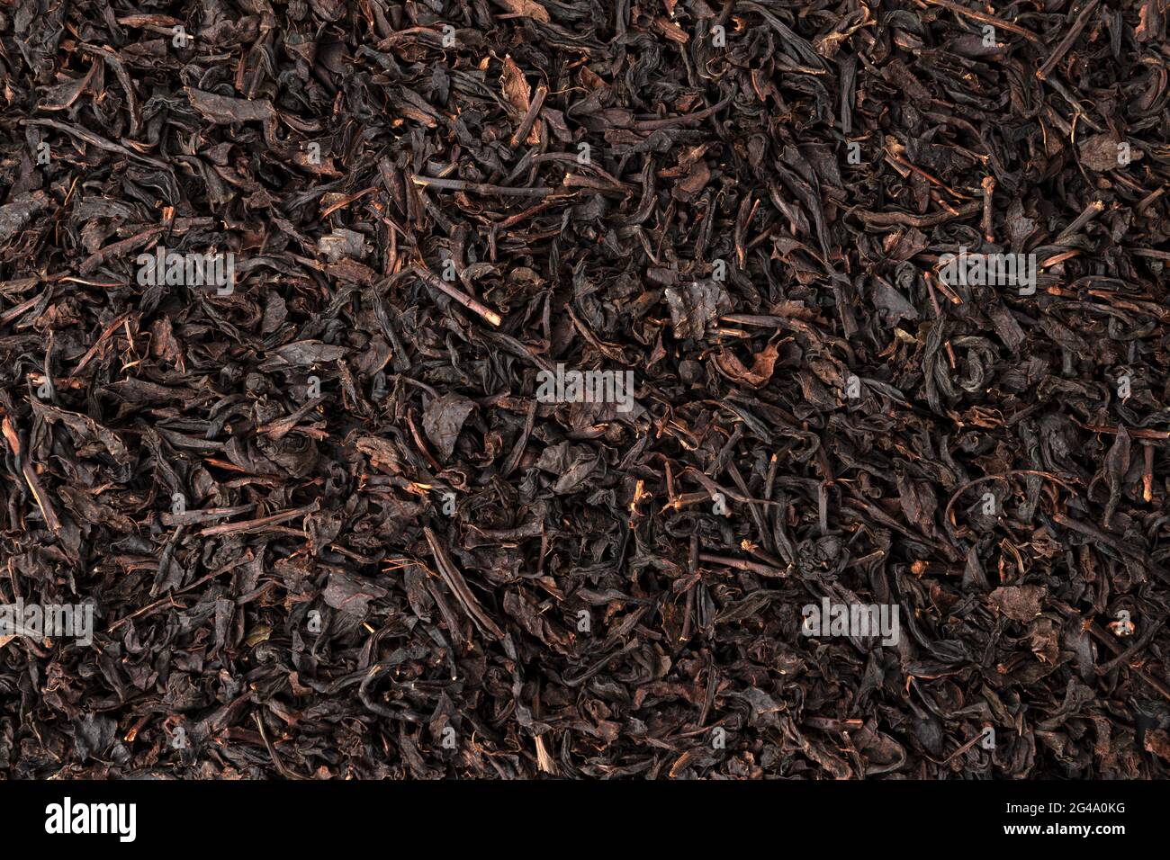 Dry tea leaves background or texture, black tea pattern Stock Photo - Alamy