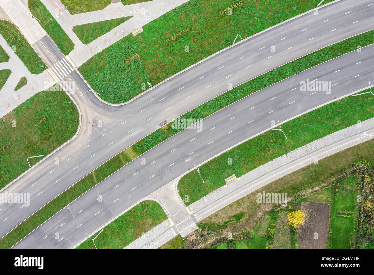 road construction site in suburb area. new asphalted road ready to use ...