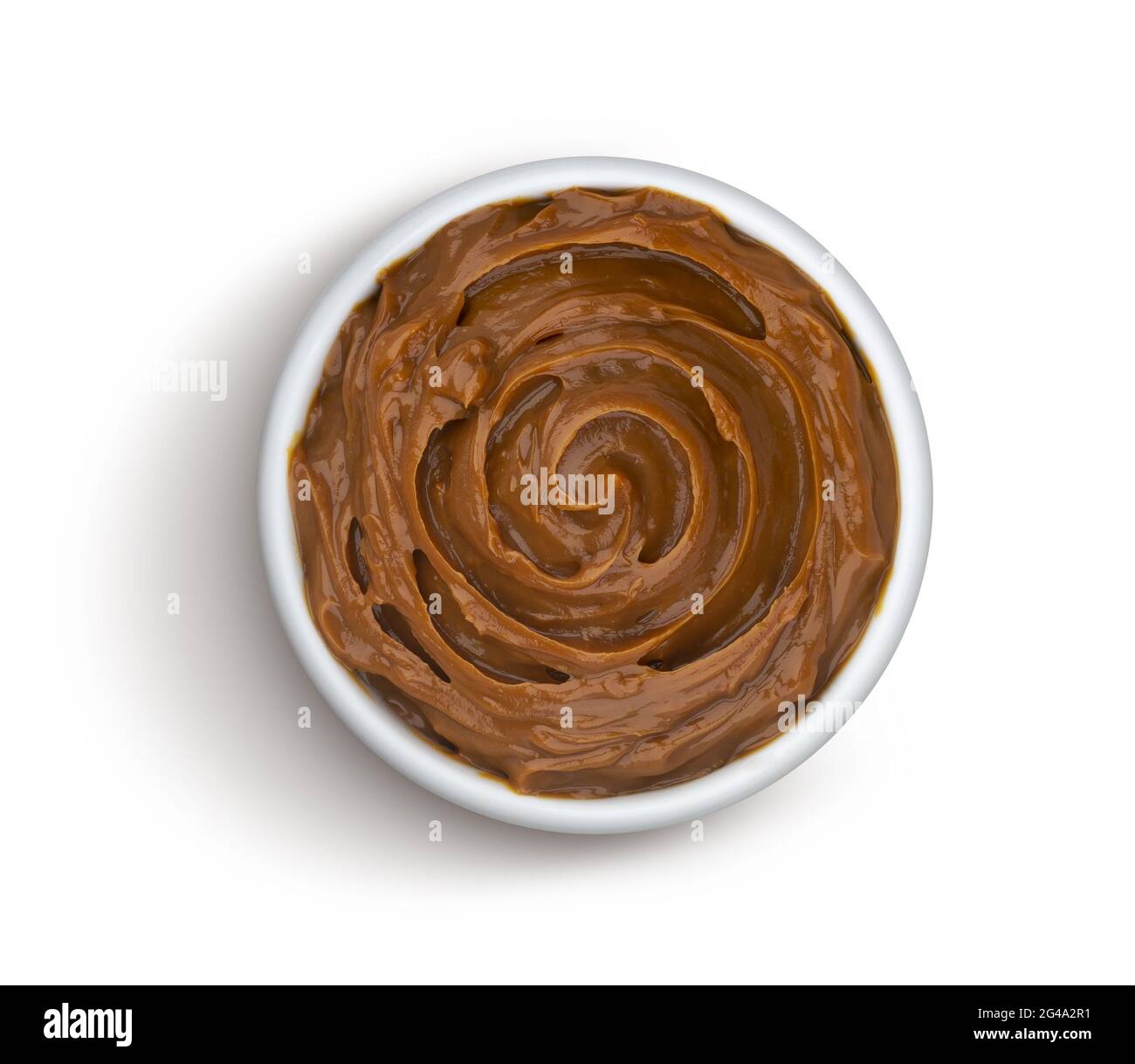 Boiled condensed milk isolated on white background Stock Photo - Alamy