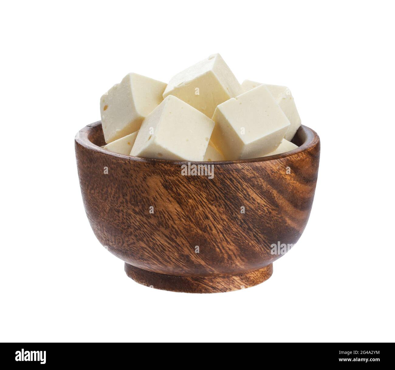 Greek feta cubes in wooden bowl. Diced soft cheese isolated on white ...