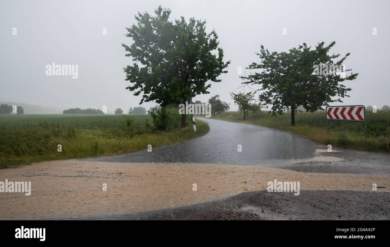Hanover, Germany. 20th June, 2021. Rainwater and mud flow over a ...