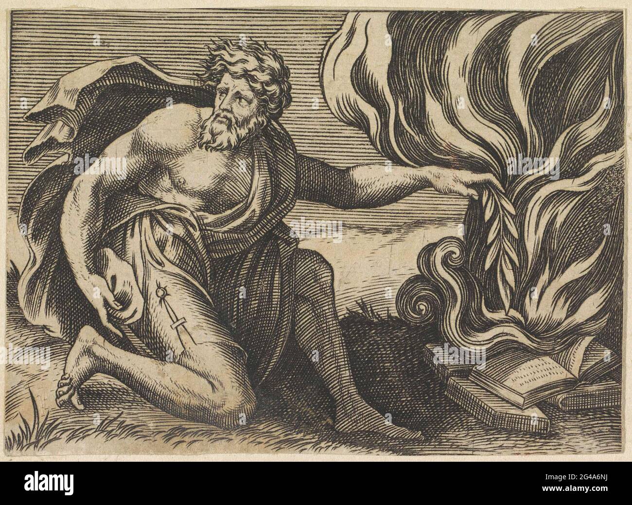 Book burning. A man with beard burns a stack of books Stock Photo - Alamy