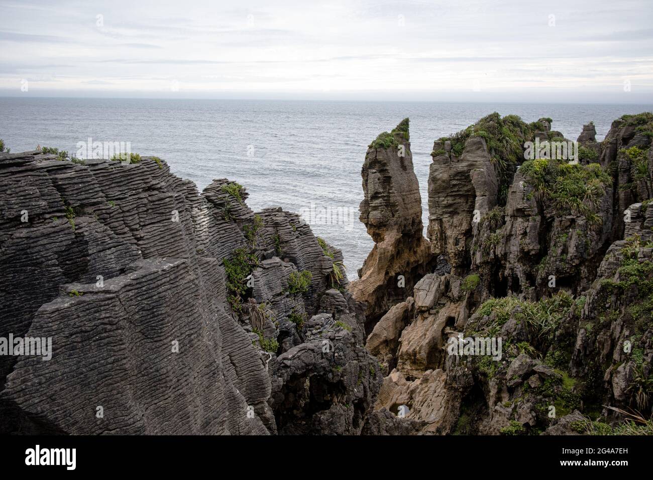 Punakaiki pancake rocks and blowhole walk, New Zealand. A limestone ...