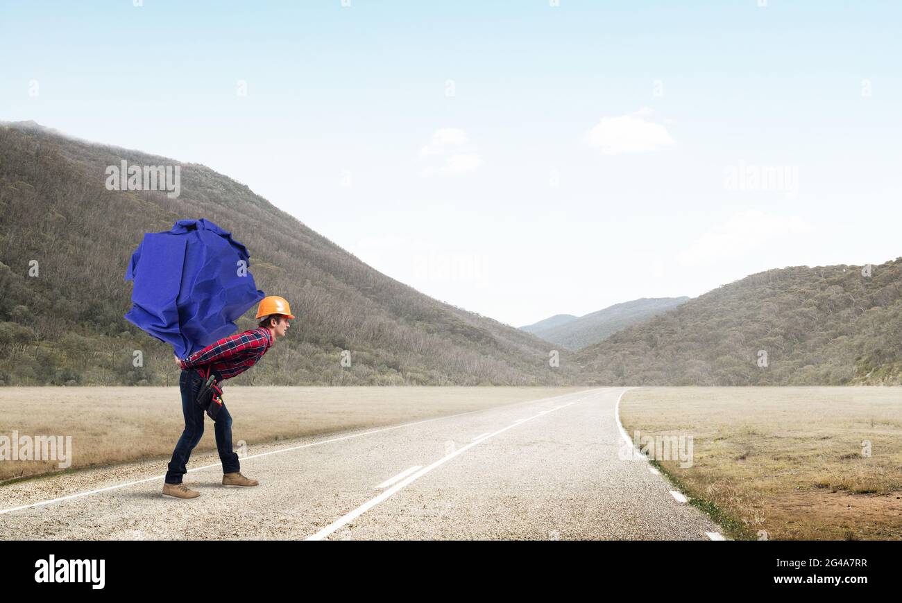 Engineer man carry load Stock Photo - Alamy